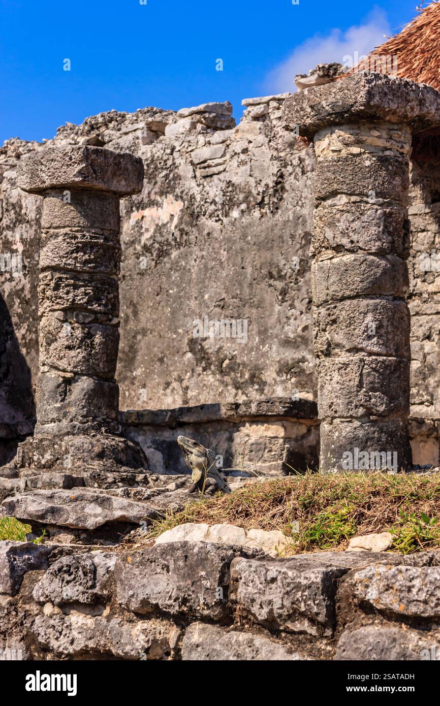 A stone wall with three pillars, one of which is missing. The wall ...