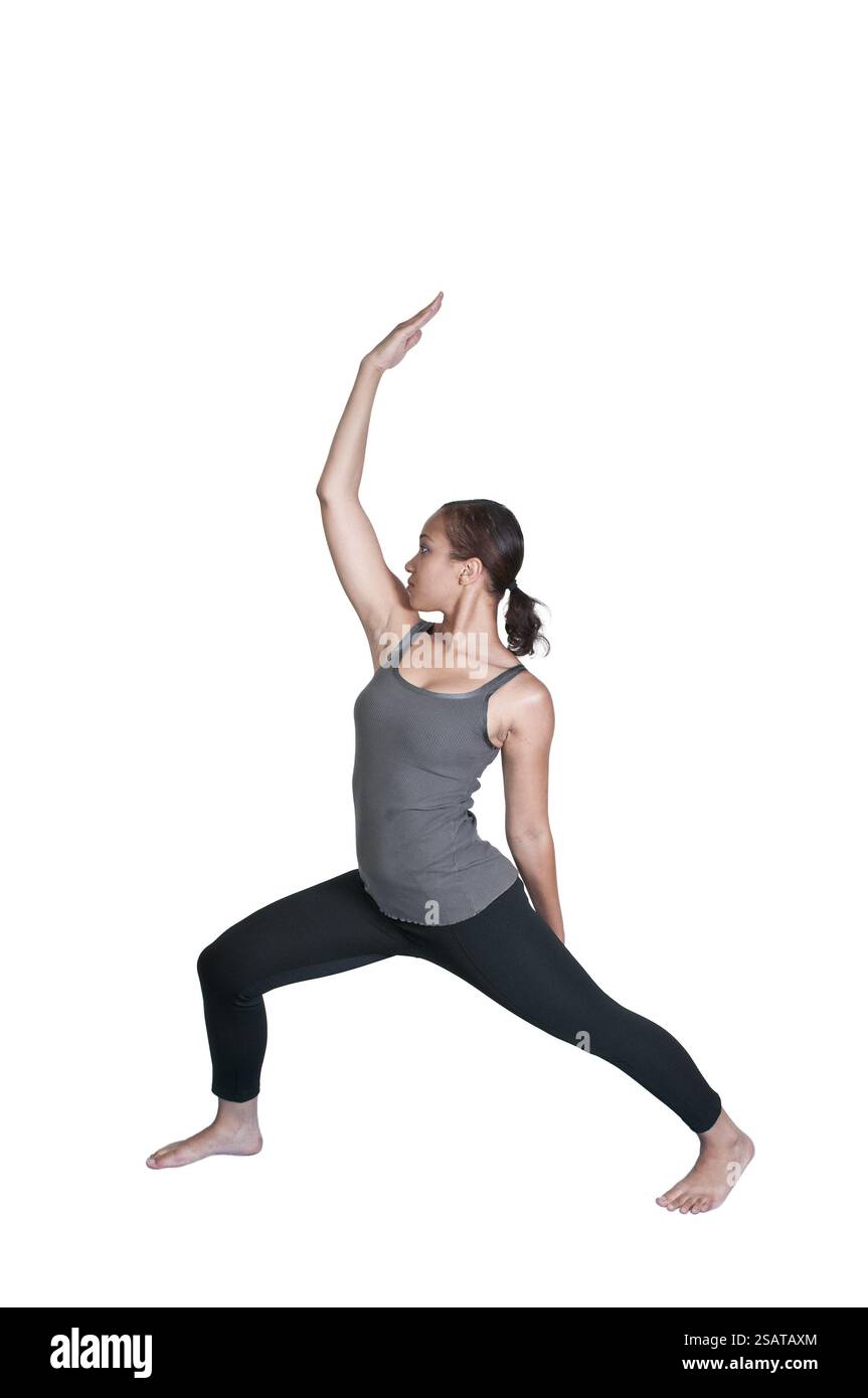 Beautiful black African American woman doing her Yoga stance exercises ...
