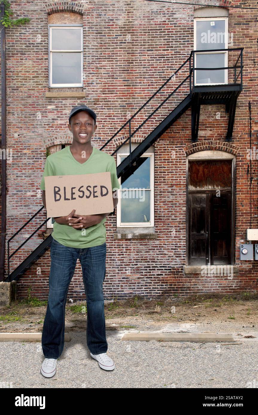 Handsome man holds sign hi-res stock photography and images - Alamy