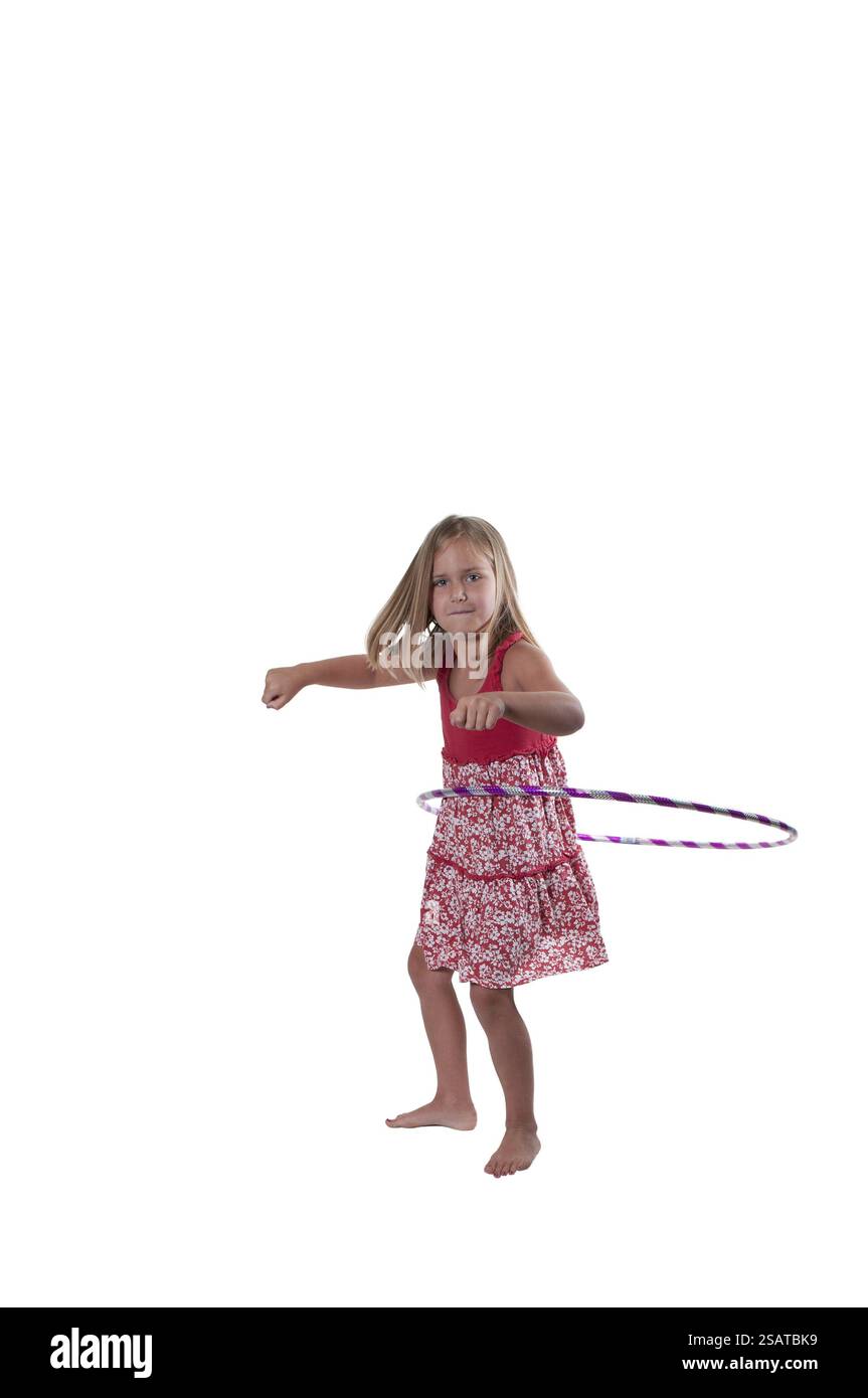 Beautiful little girl with a hula hoop Stock Photo - Alamy