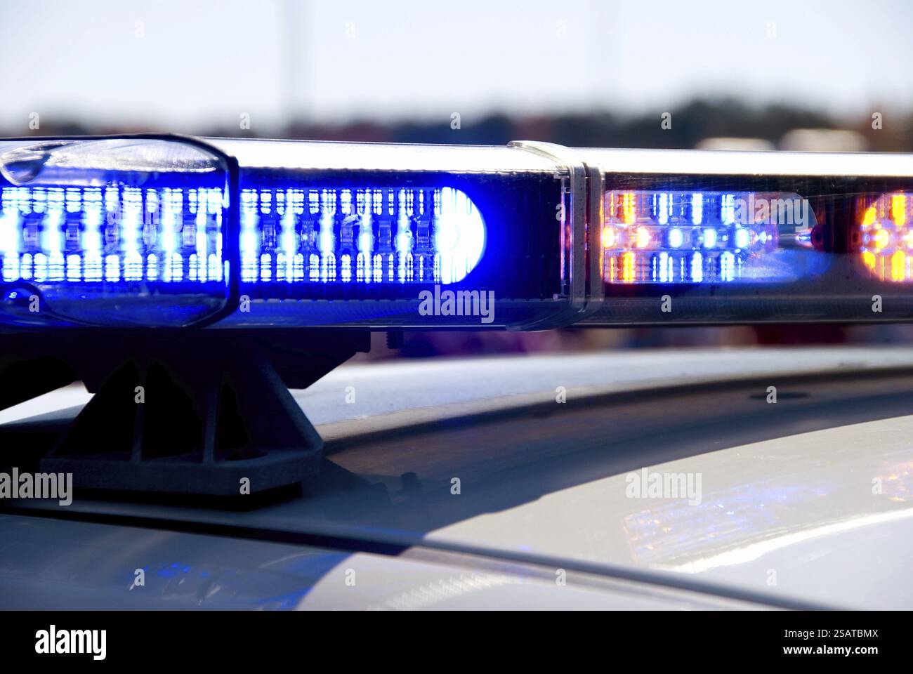 The light bar on top of a police cruiser Stock Photo - Alamy