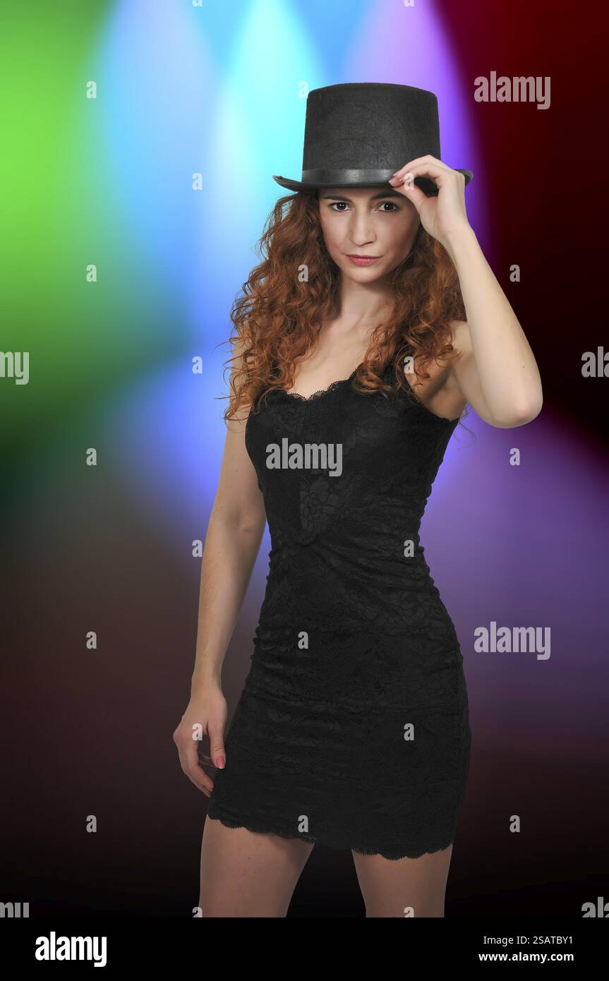 Beautiful young actress dancer wearing a top hat Stock Photo - Alamy