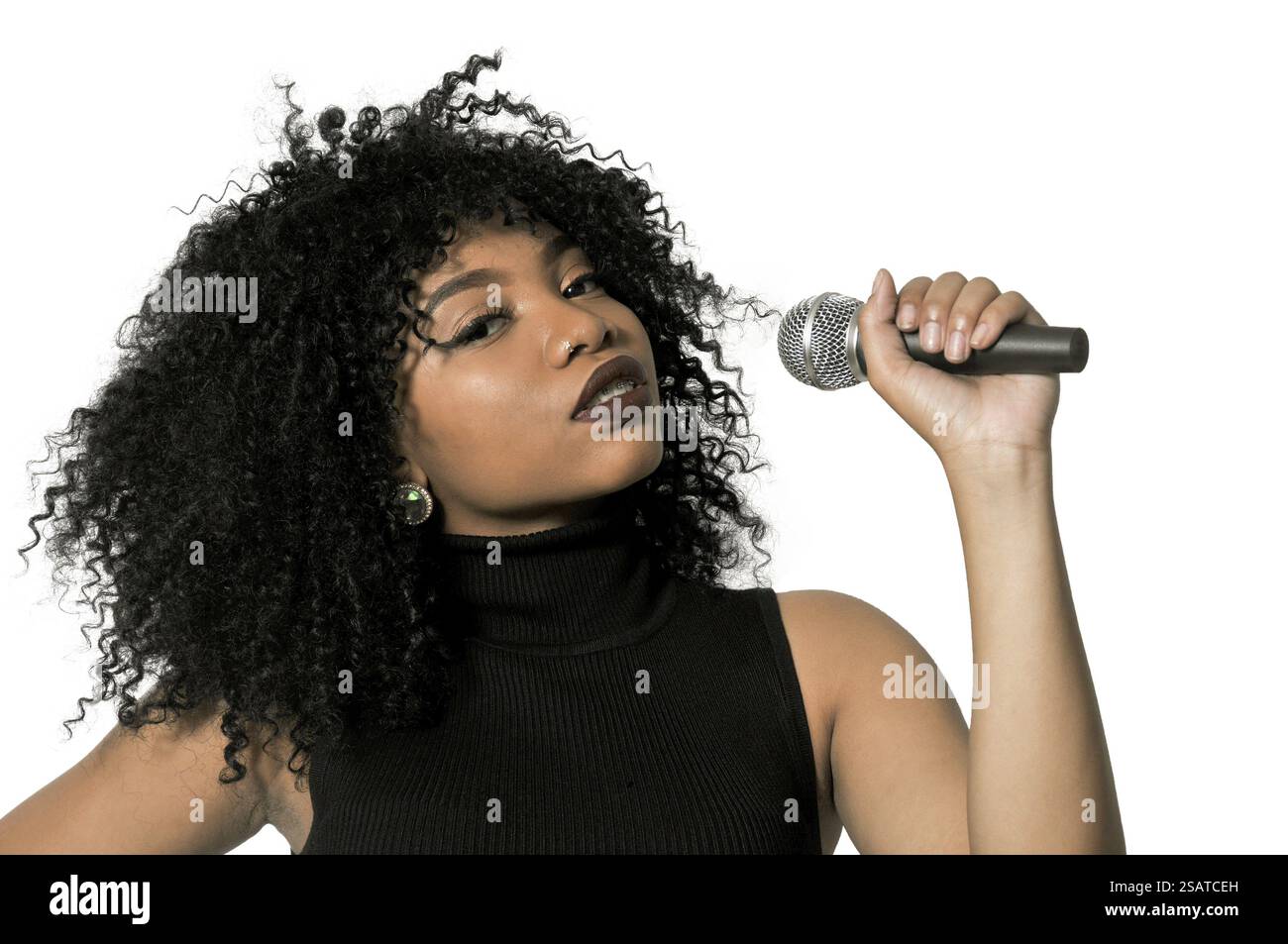 Beautiful woman singer performing at a concert Stock Photo - Alamy