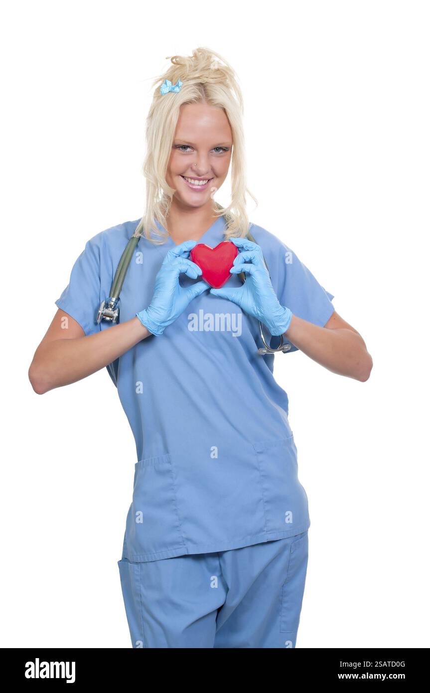 A female cardiologist woman doctor holding a red heart Stock Photo - Alamy