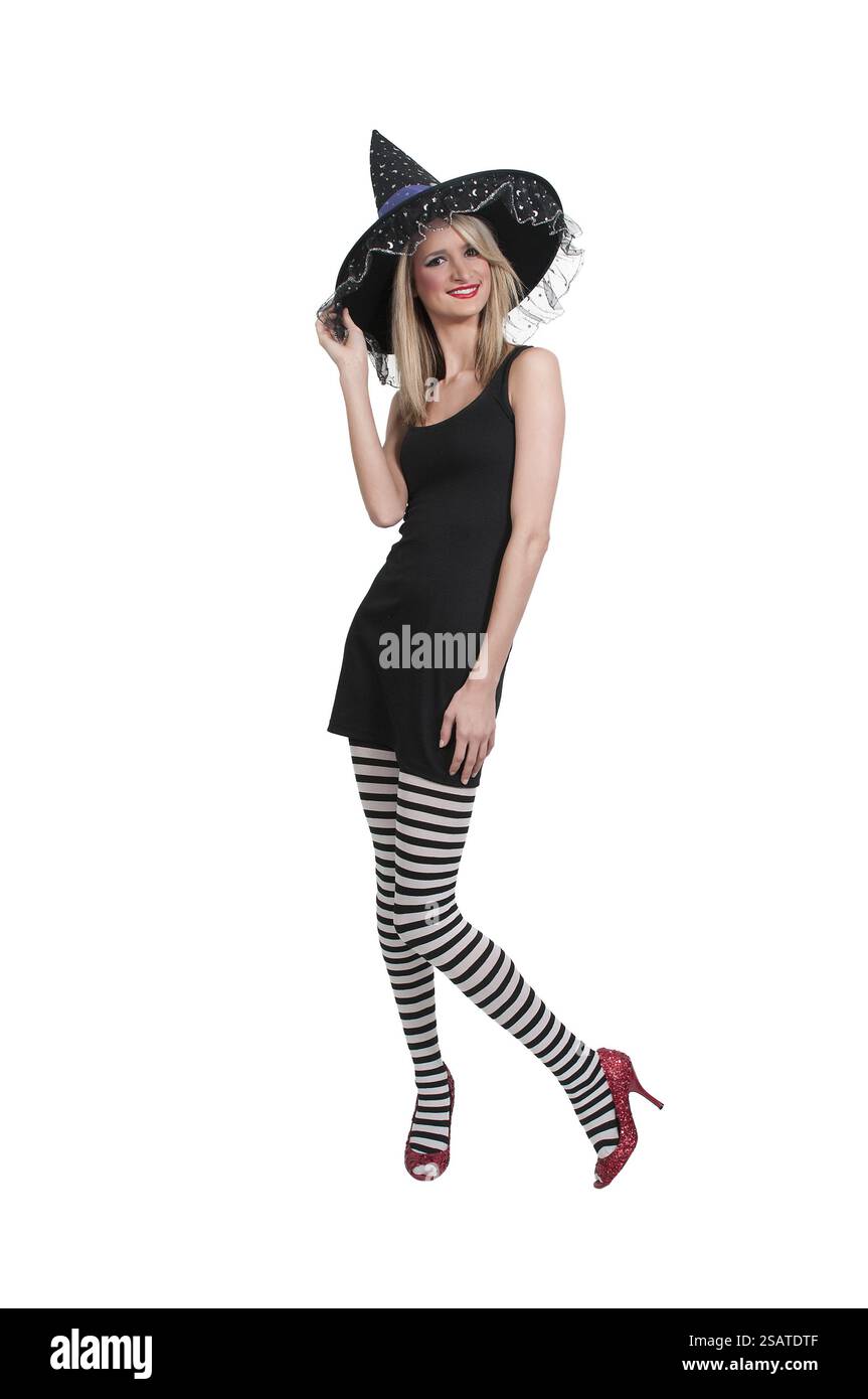 Beautiful woman wicked witch with ruby shoes Stock Photo - Alamy