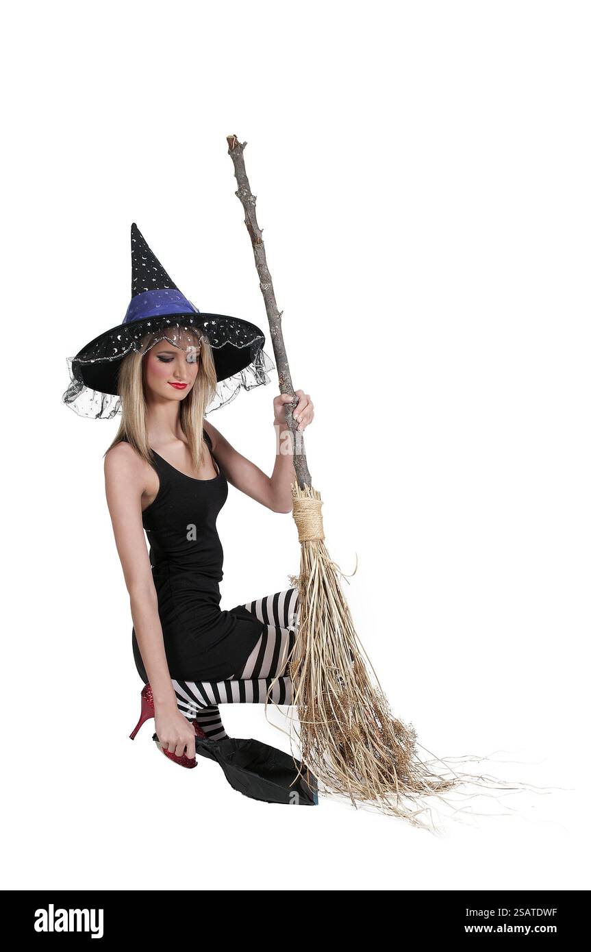 Beautiful woman wicked witch with ruby shoes Stock Photo - Alamy