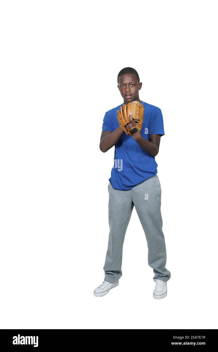 A black African American teenage man baseball pitcher getting ready to ...