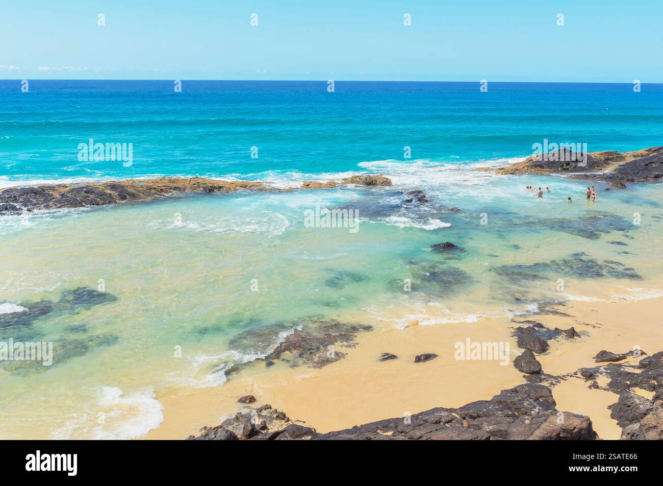 People swimming in champagne pools, Great Sandy National Park, Fraser ...