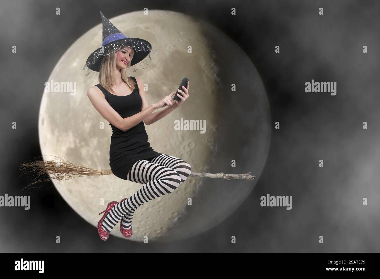 Beautiful woman wicked witch with ruby shoes Stock Photo - Alamy