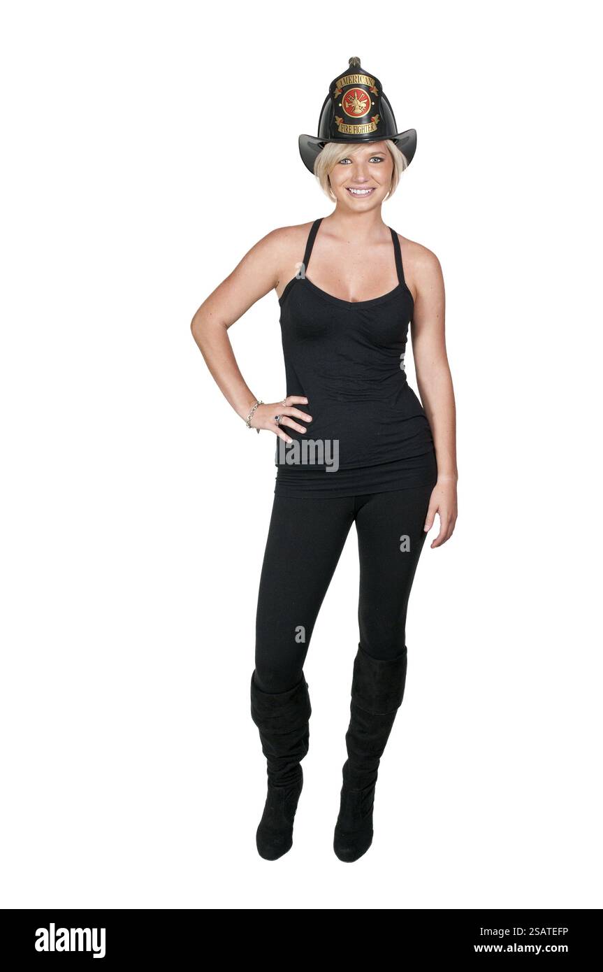 A beautiful woman firefighter at a fire Stock Photo - Alamy