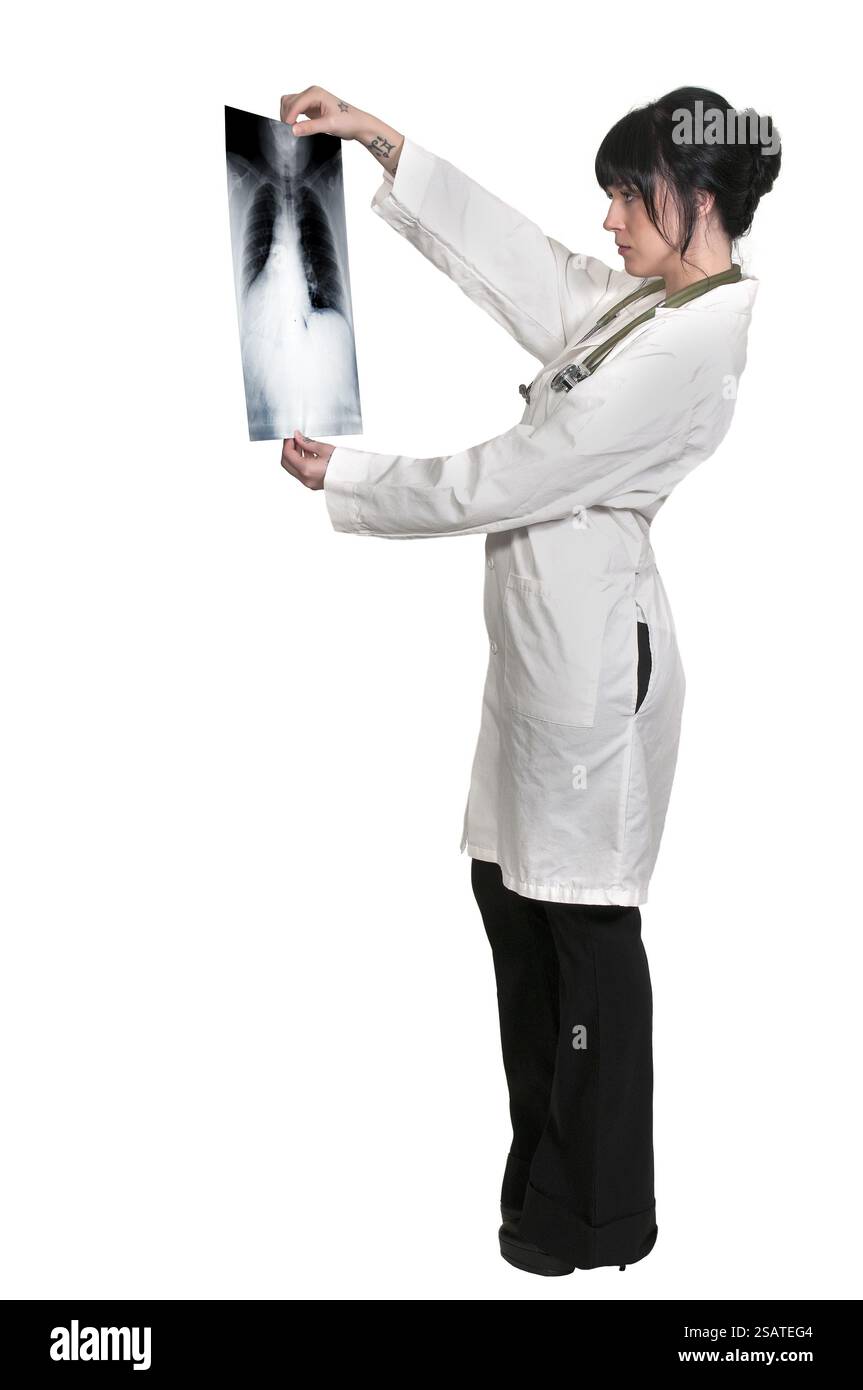 A beautiful female radiologist examining an x-ray Stock Photo - Alamy