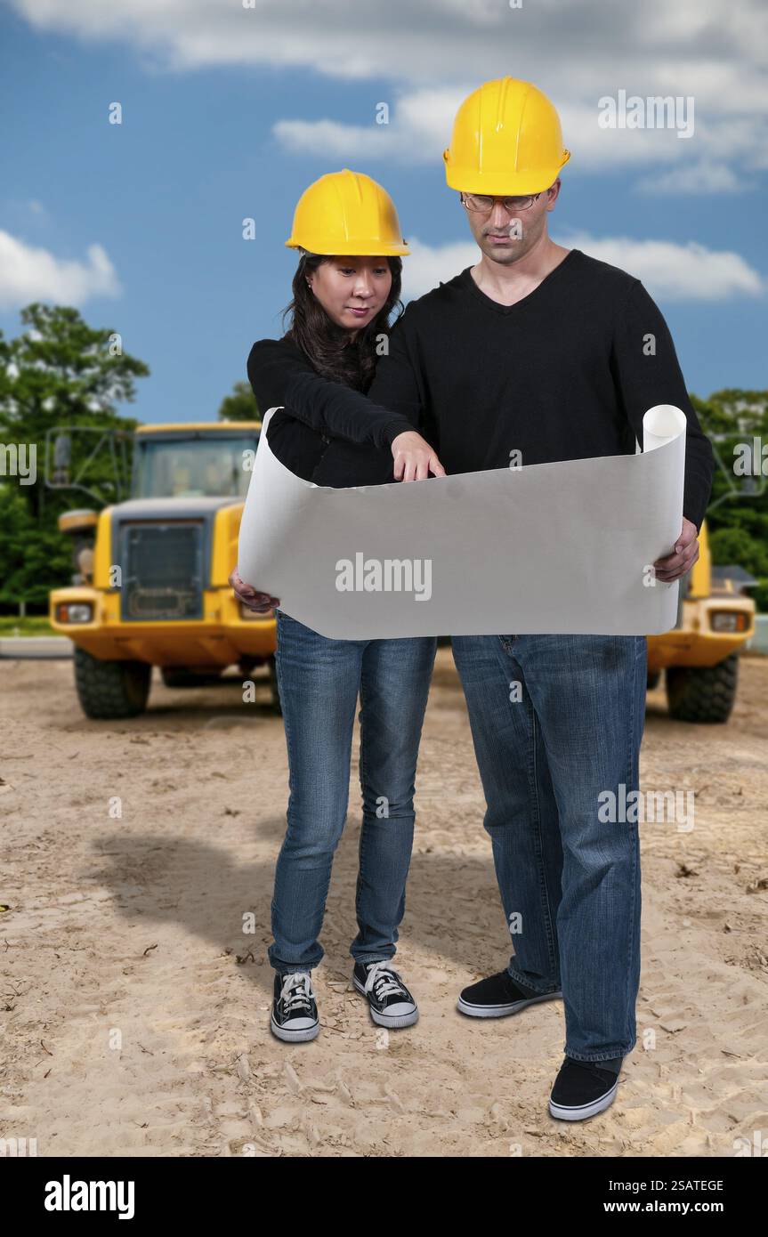 Man and Woman Construction Workers on a job site Stock Photo - Alamy