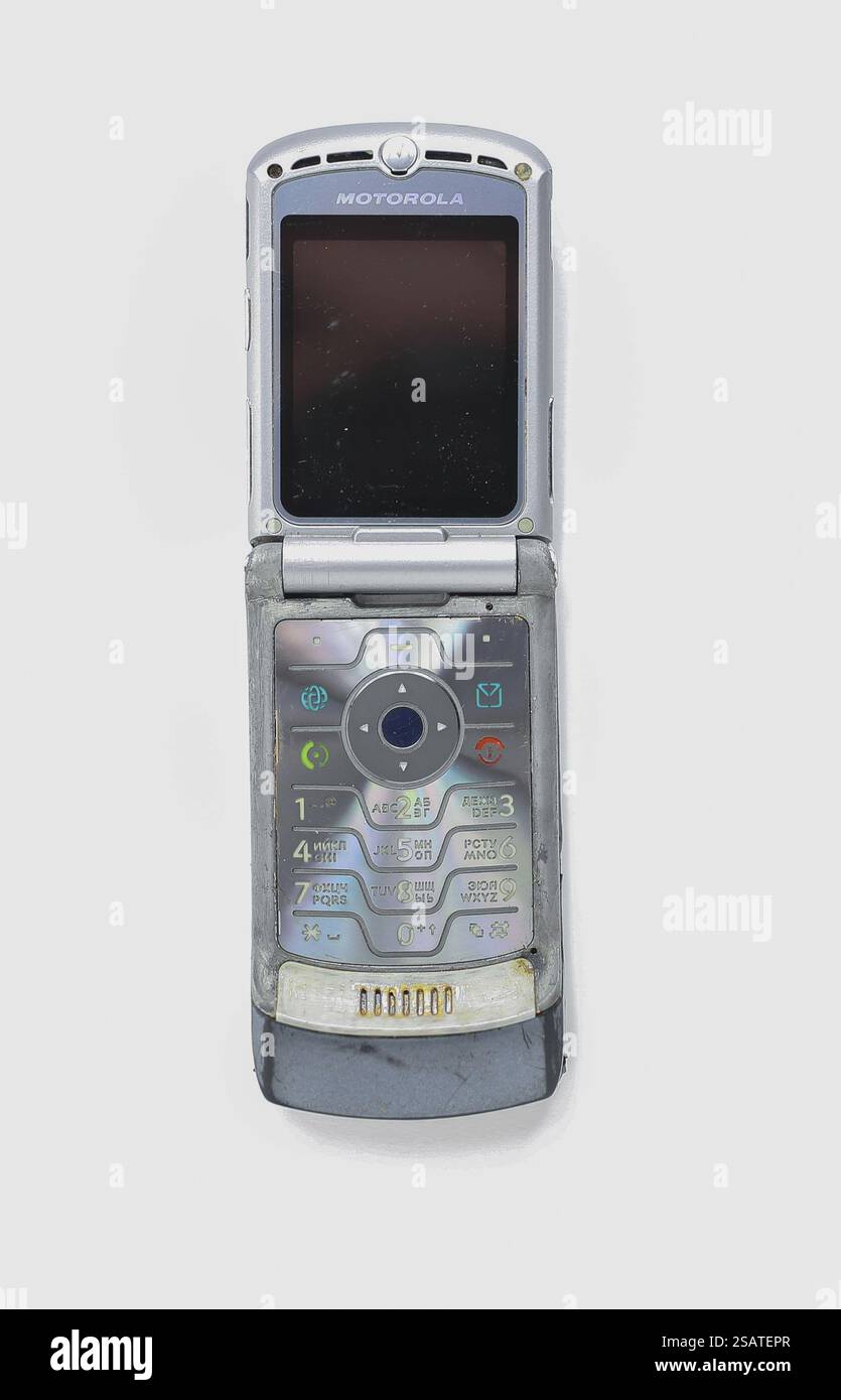 Motorola flip phone with open display and keypad, a nostalgic piece of ...