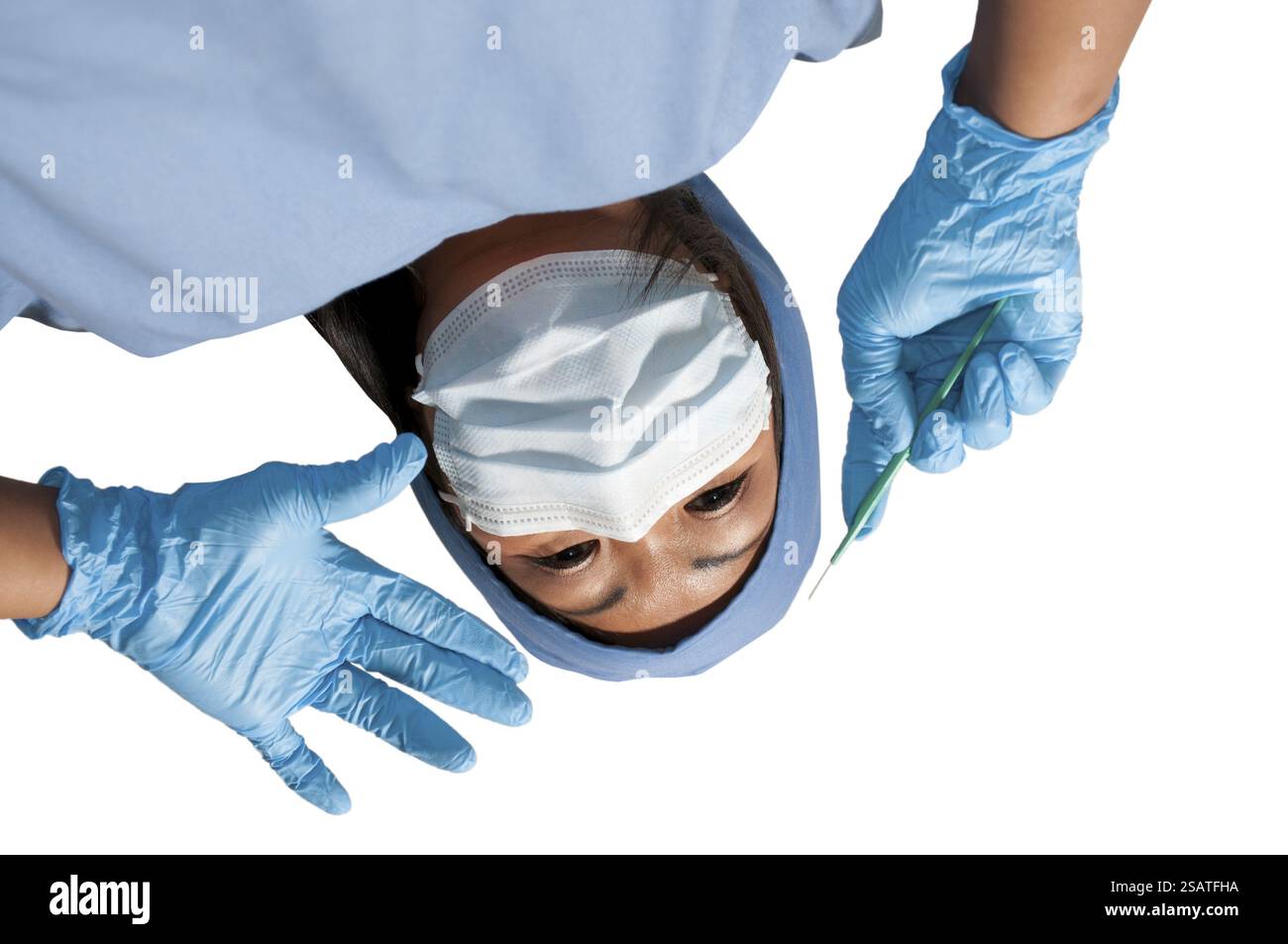 A beautiful young woman surgeon performing surgery Stock Photo - Alamy