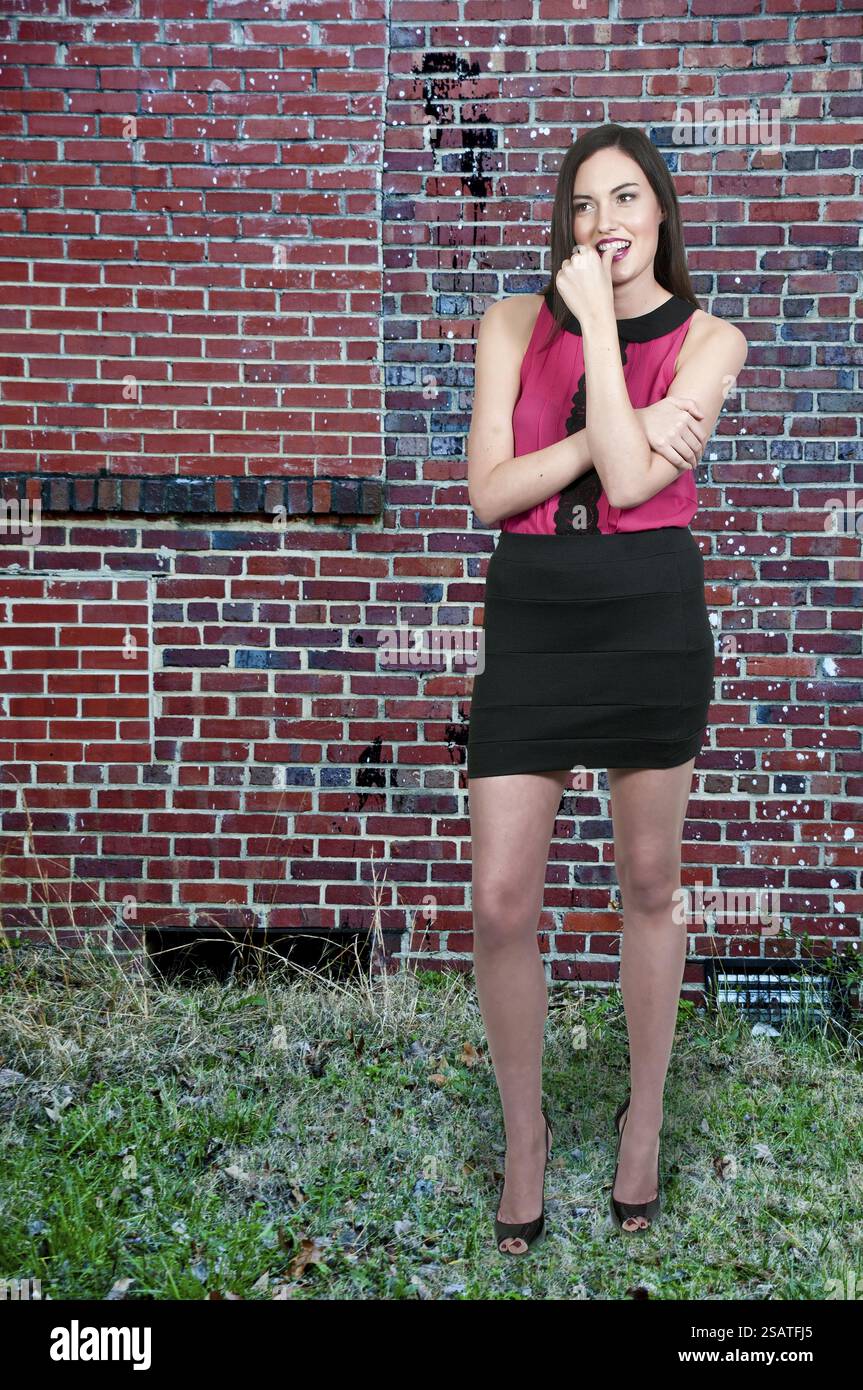Beautiful woman thinking and deep in thought Stock Photo - Alamy