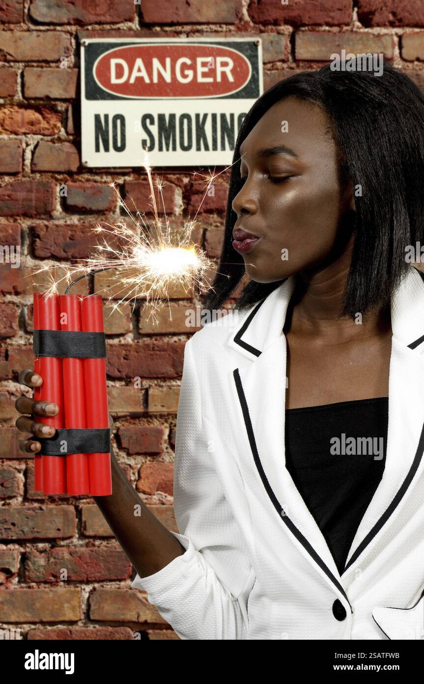 Holding sticks dynamite hi-res stock photography and images - Alamy