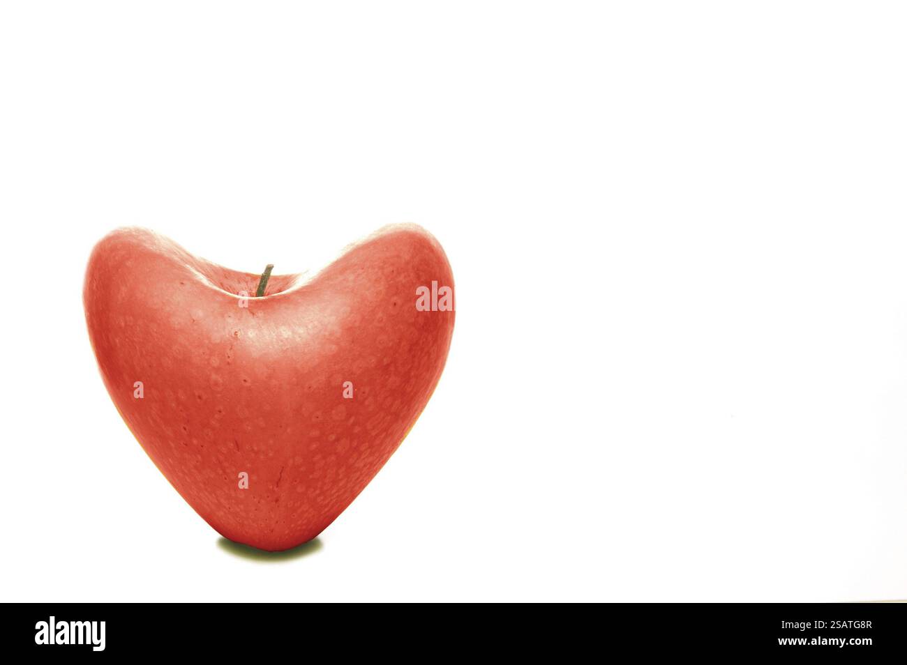 A ready to eat heart shaped apple Stock Photo - Alamy
