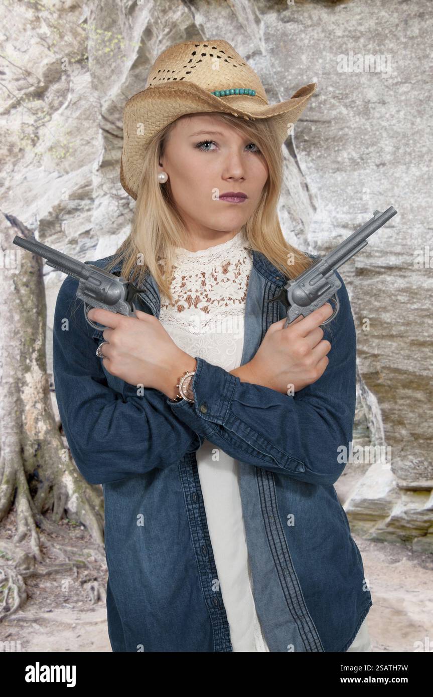 Beautiful young country girl woman wearing a stylish cowboy hat and ...