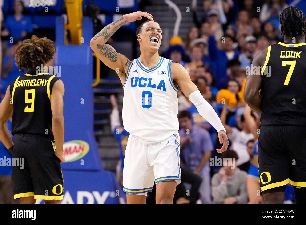 UCLA guard Kobe Johnson, celebrates as a timeout is called while Oregon ...