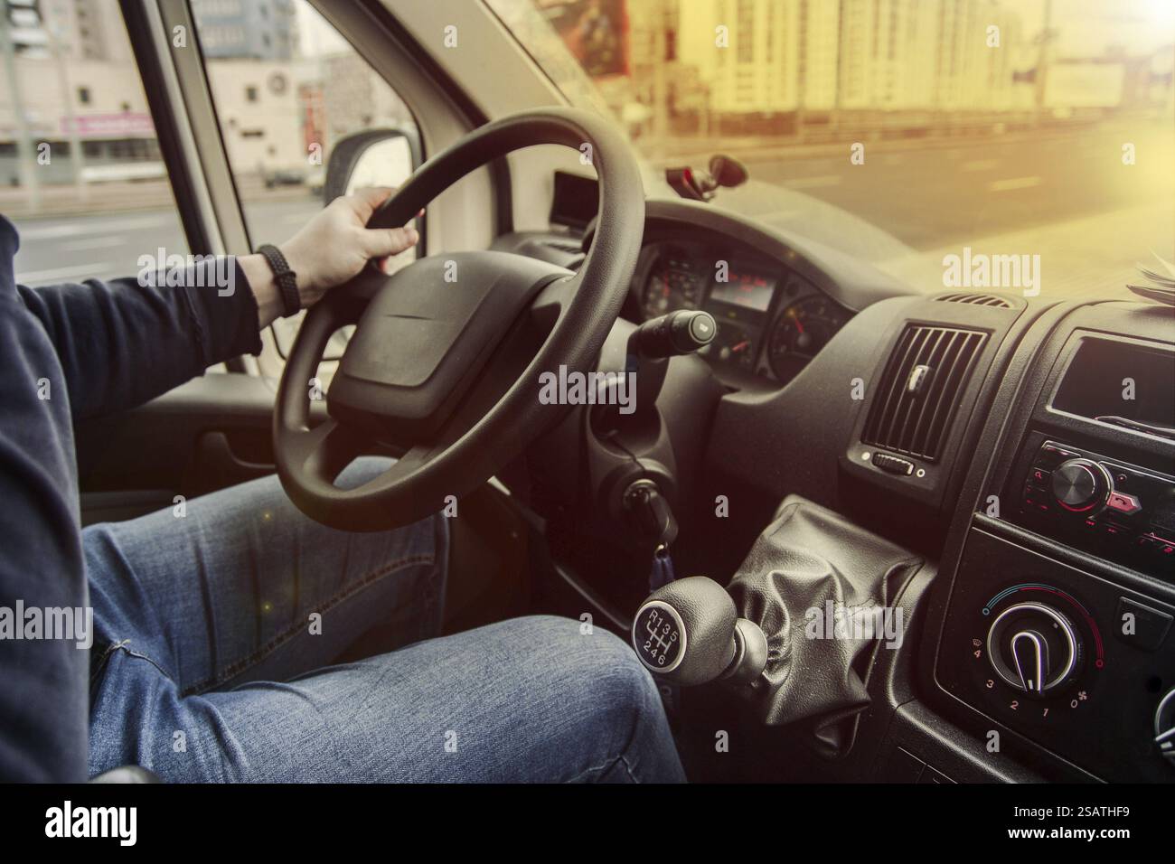 Driving in a van with manual transmission, urban road view Stock Photo ...