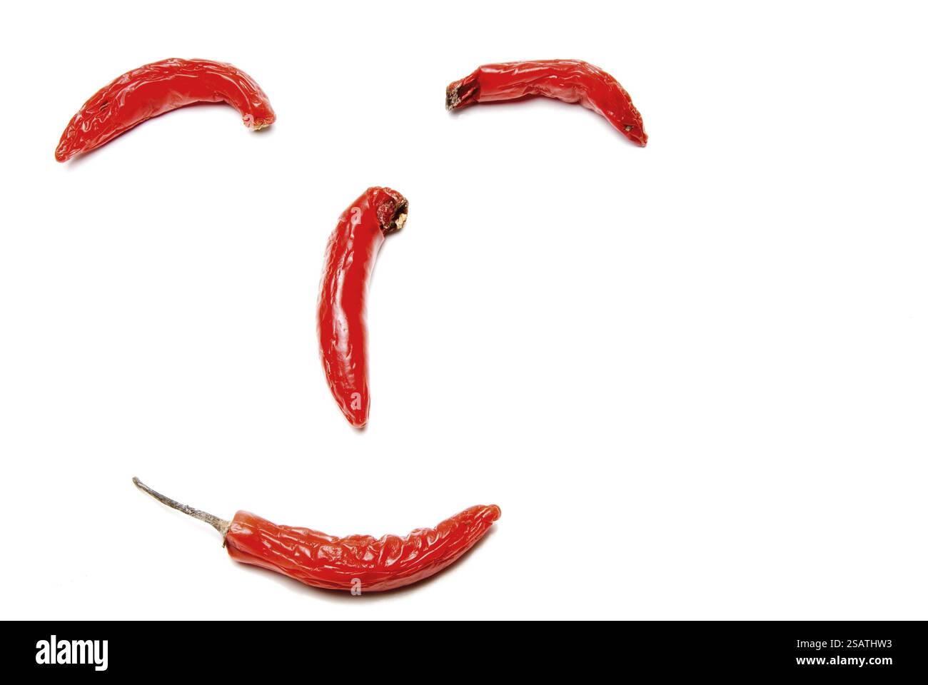 Hot Red Peppers making a smiley face Stock Photo - Alamy