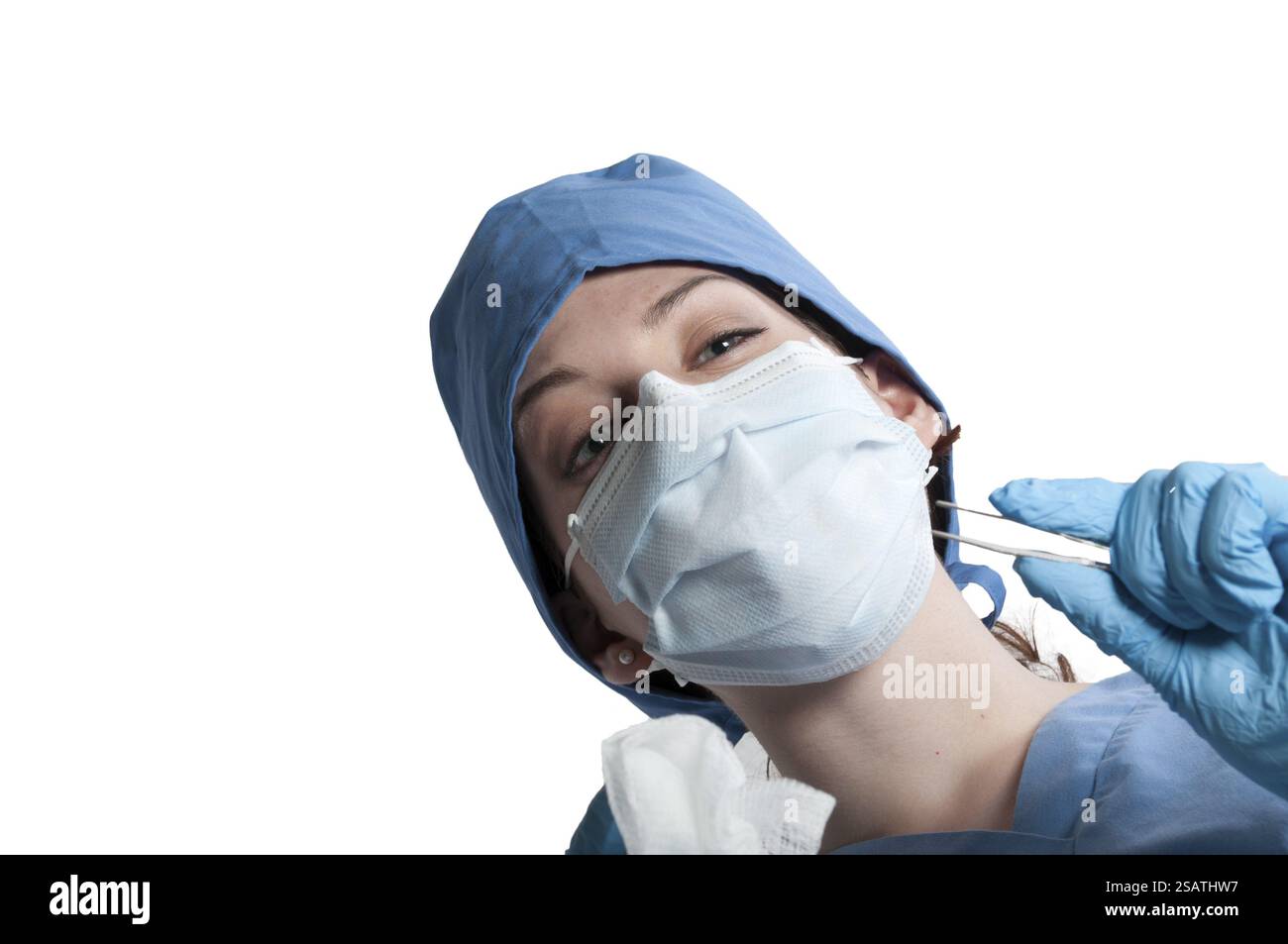 A beautiful young woman surgeon performing surgery Stock Photo - Alamy