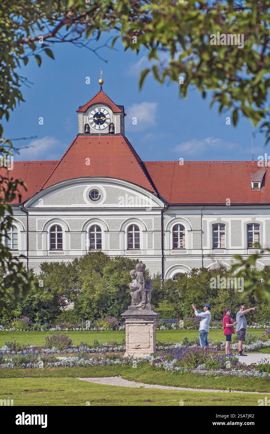 Outbuilding with turret and clock in the Sclosspark, Nymphenburg Palace ...