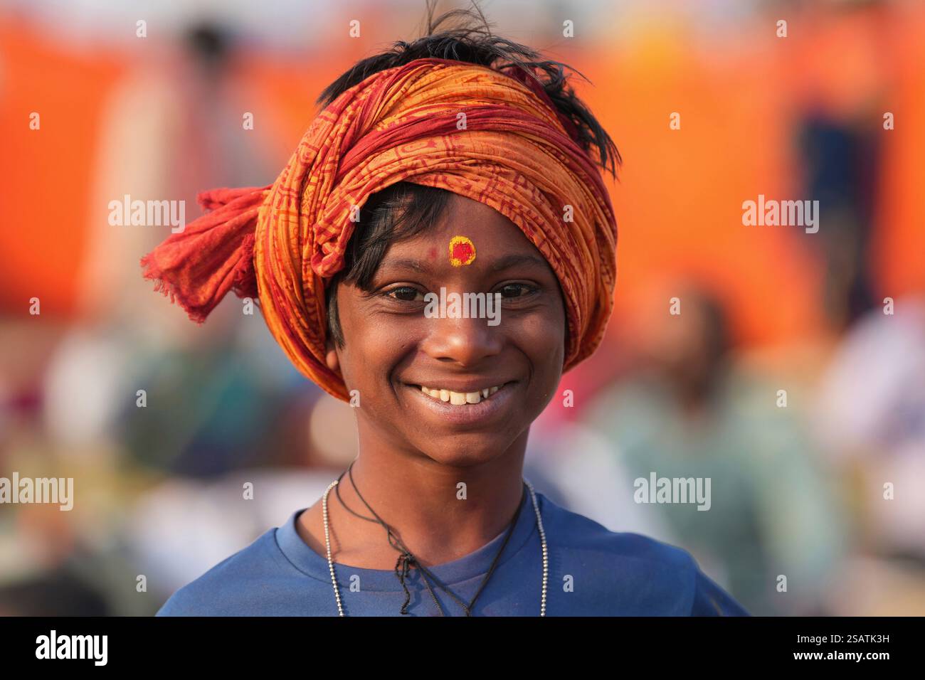A young Hindu devotee wears a sacred mark on his forehead at the ...