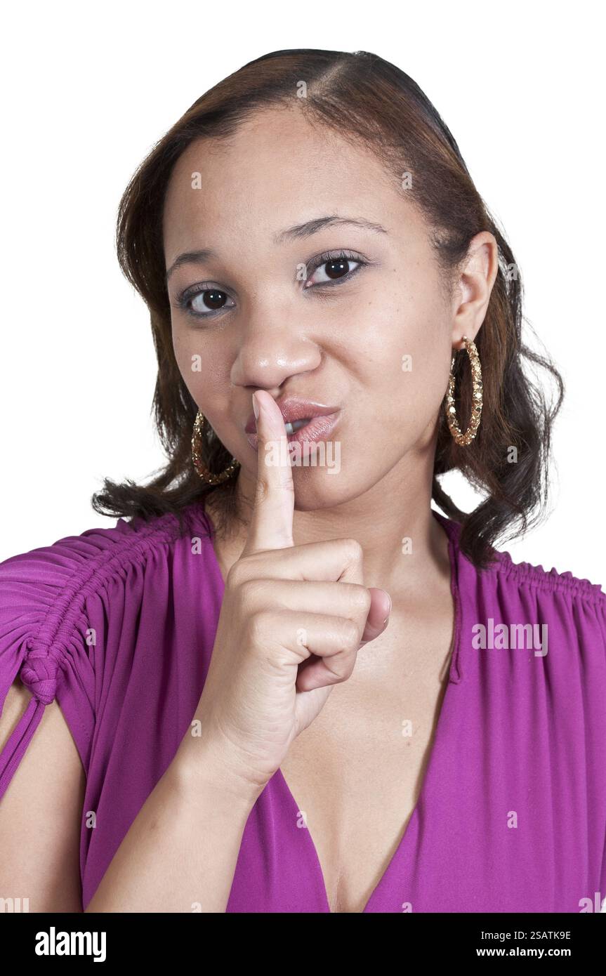 Black African American woman saying be quiet by saying shhh Stock Photo ...