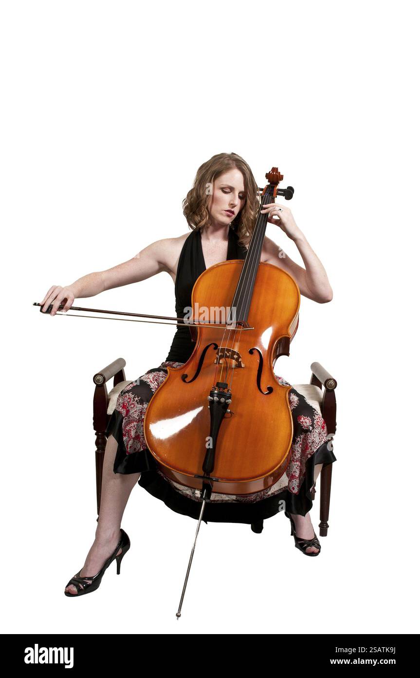 Beautiful woman cellist with her cello musical instrument Stock Photo ...