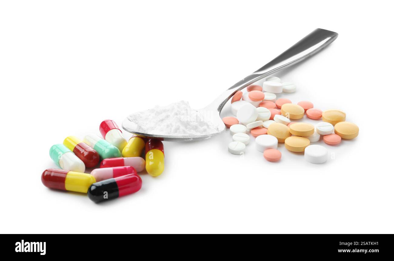 Drug addiction. Different pills and spoon with powder isolated on white ...