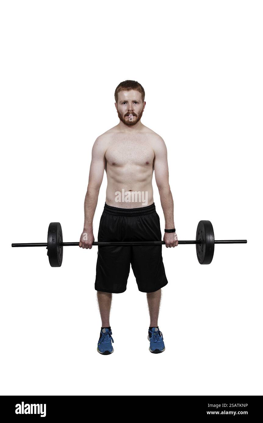 Handsome young muscular man lifting a weight Stock Photo - Alamy