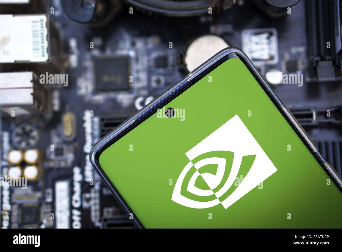 NVIDIA logo on phone and blurred chip on the background-Dhaka ...