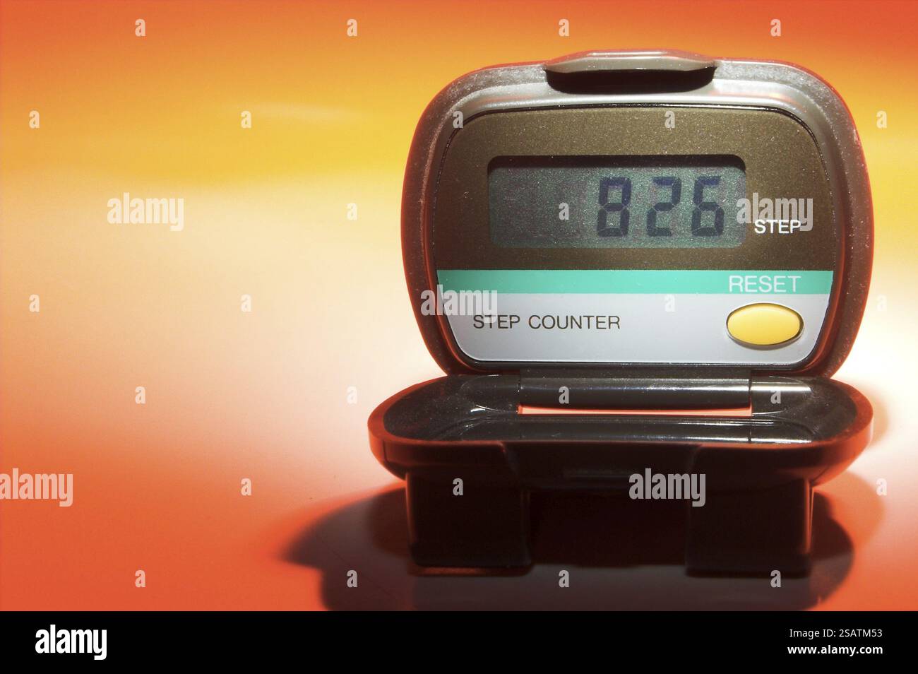 A pedometer used to count steps while walking. Fitness concept Stock ...