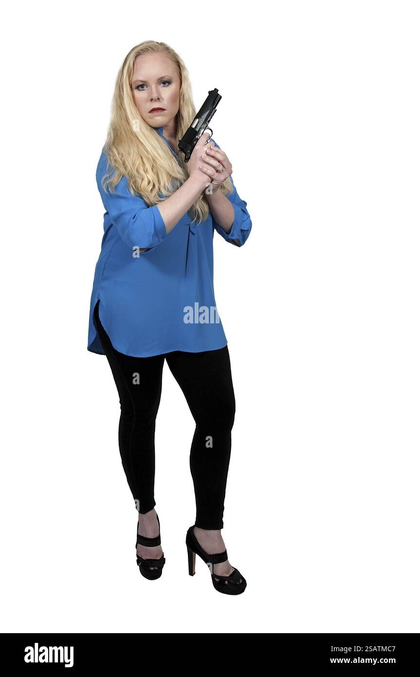Beautiful woman with a loaded handgun pistol Stock Photo - Alamy