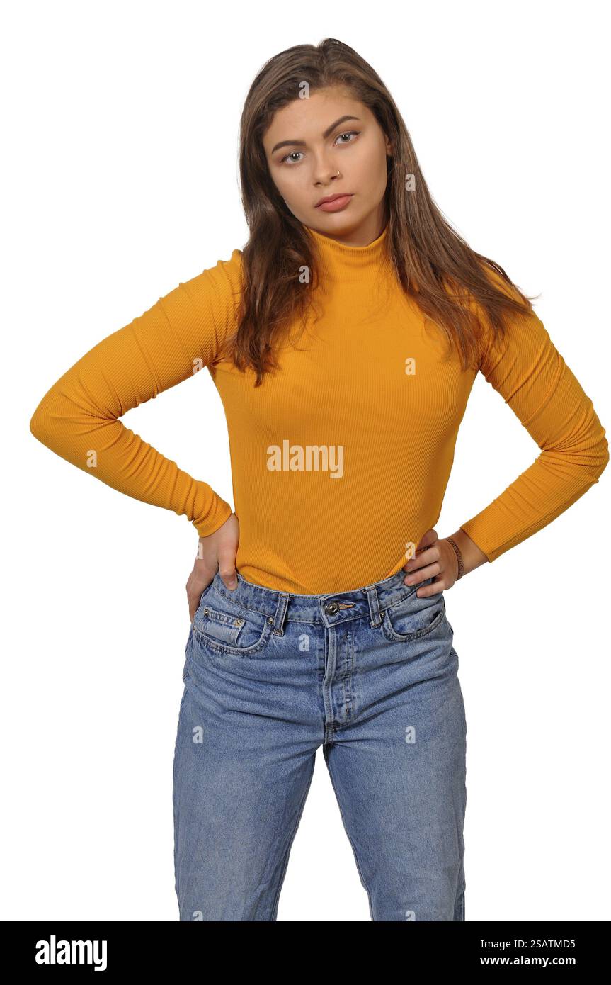 Beautiful young attractive woman in jeans modeling a pose Stock Photo ...