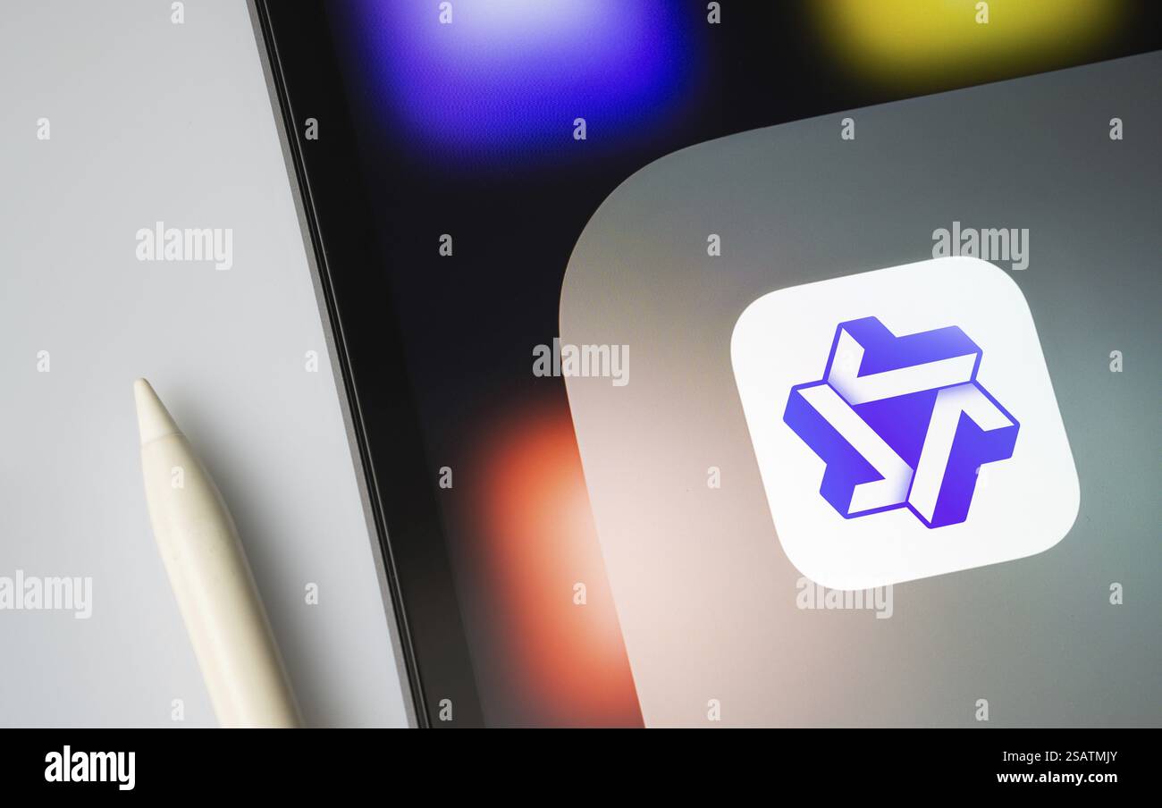 A close up of an iPad screen displaying the Alibaba Qwen AI Stock Photo ...