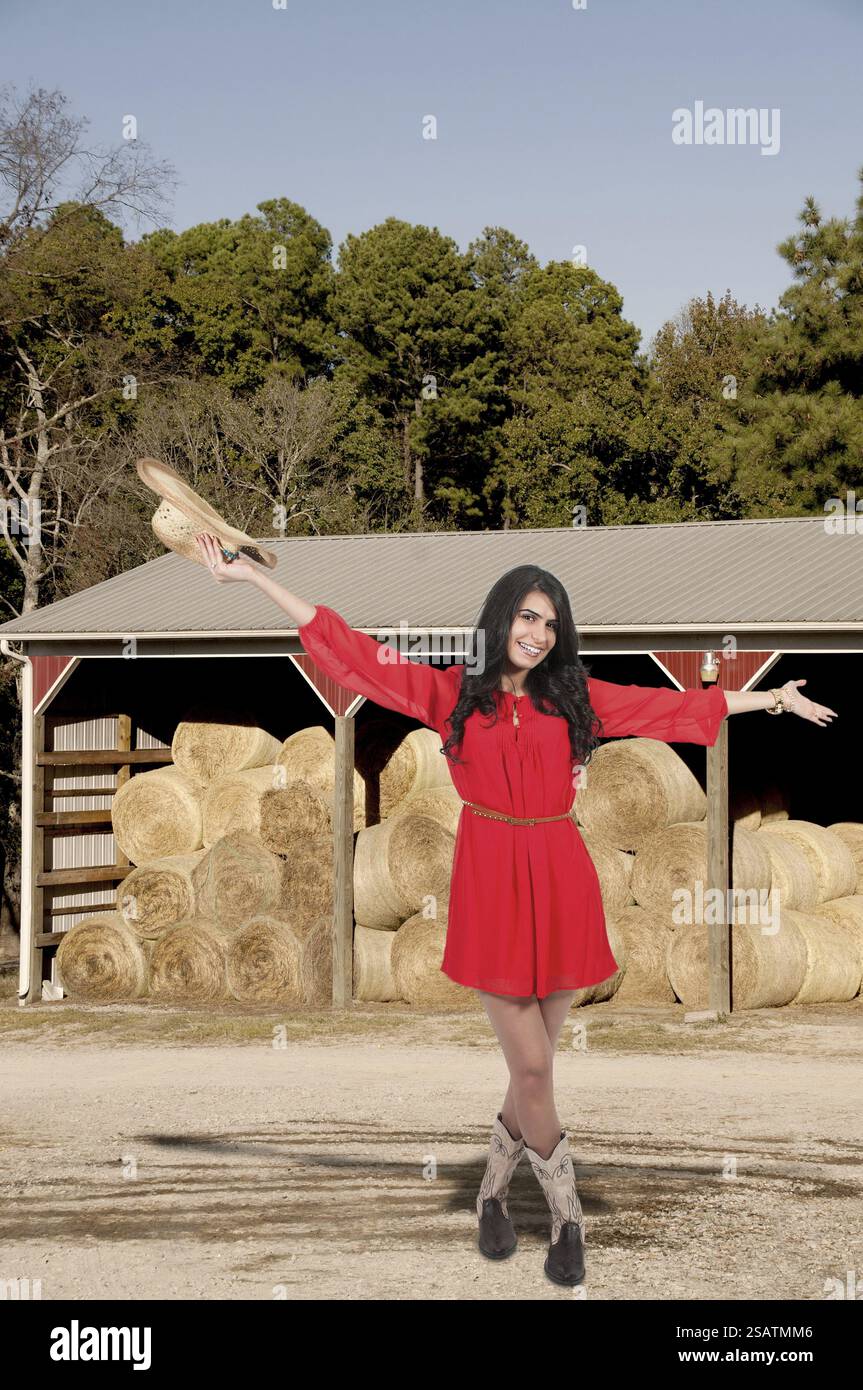 Beautiful young country girl woman wearing a stylish cowboy hat Stock ...