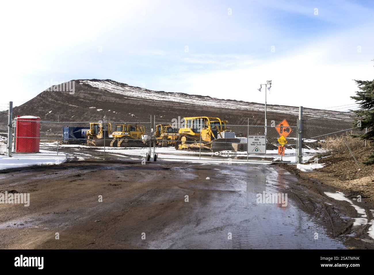 Approach to the city snow disposal storage site Stock Photo - Alamy