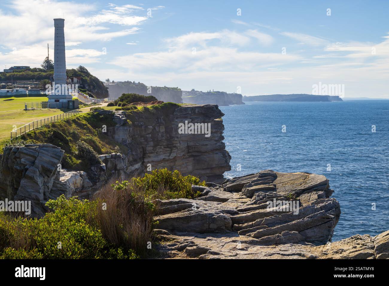 Coastal cliffs at Bondi, a suburb of Sydney, Australia. On the left is ...
