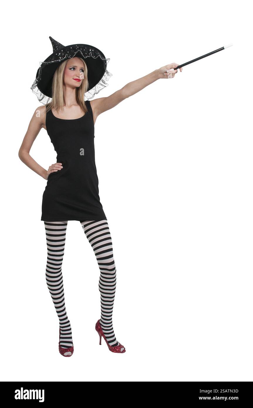 Beautiful woman wicked witch with ruby shoes Stock Photo - Alamy