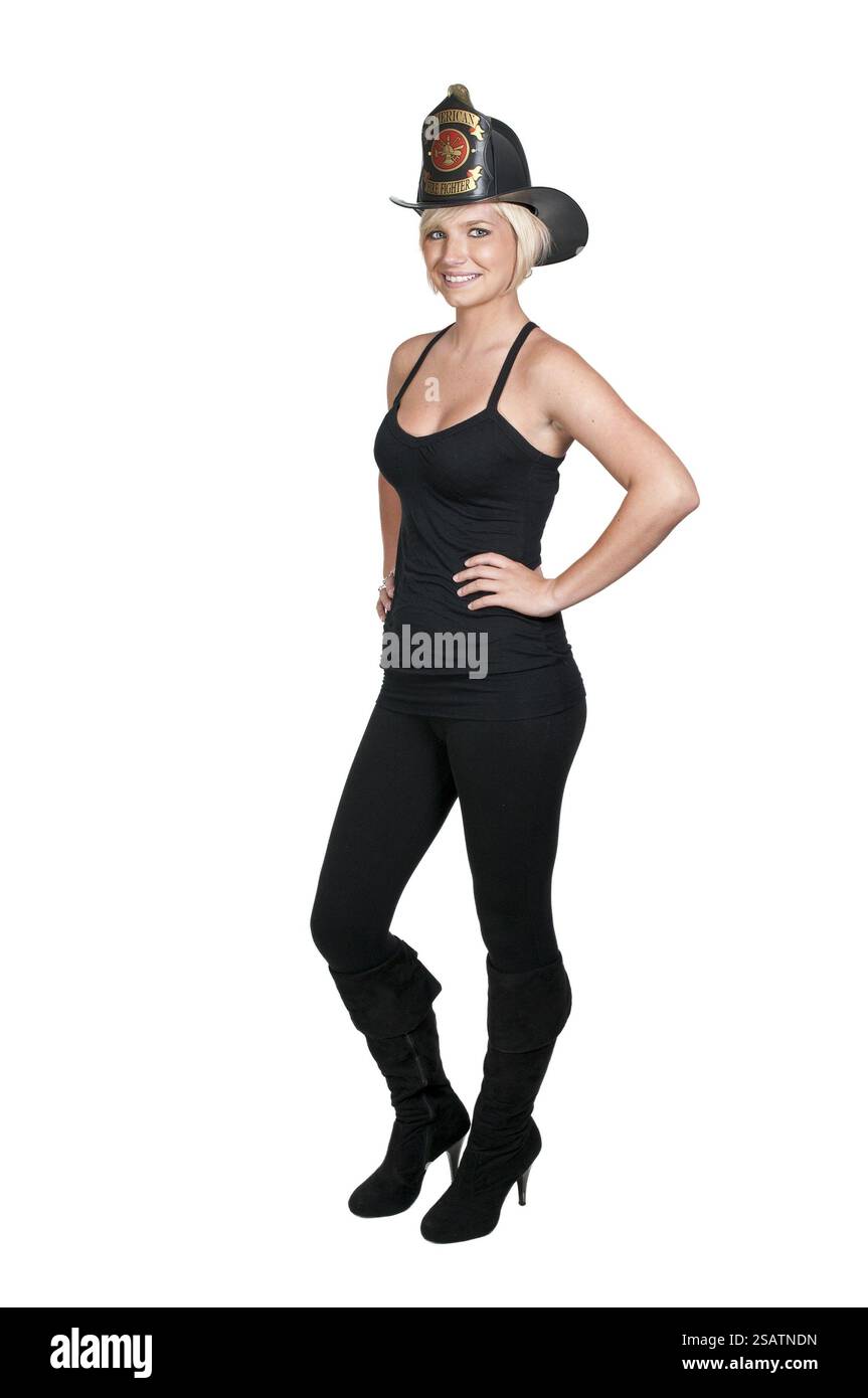 A beautiful woman firefighter at a fire Stock Photo - Alamy