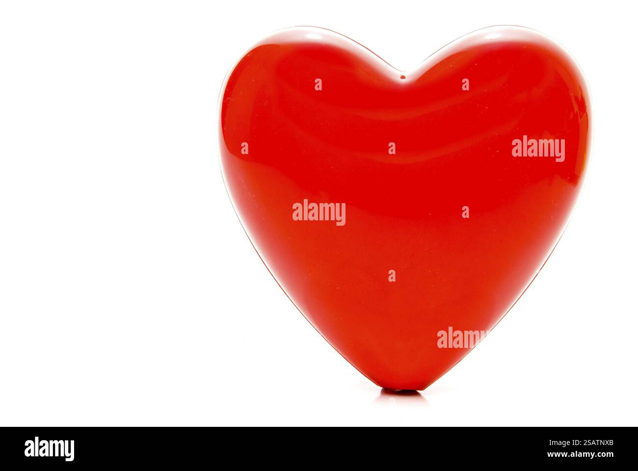 A big red heart ready for a beating Stock Photo - Alamy