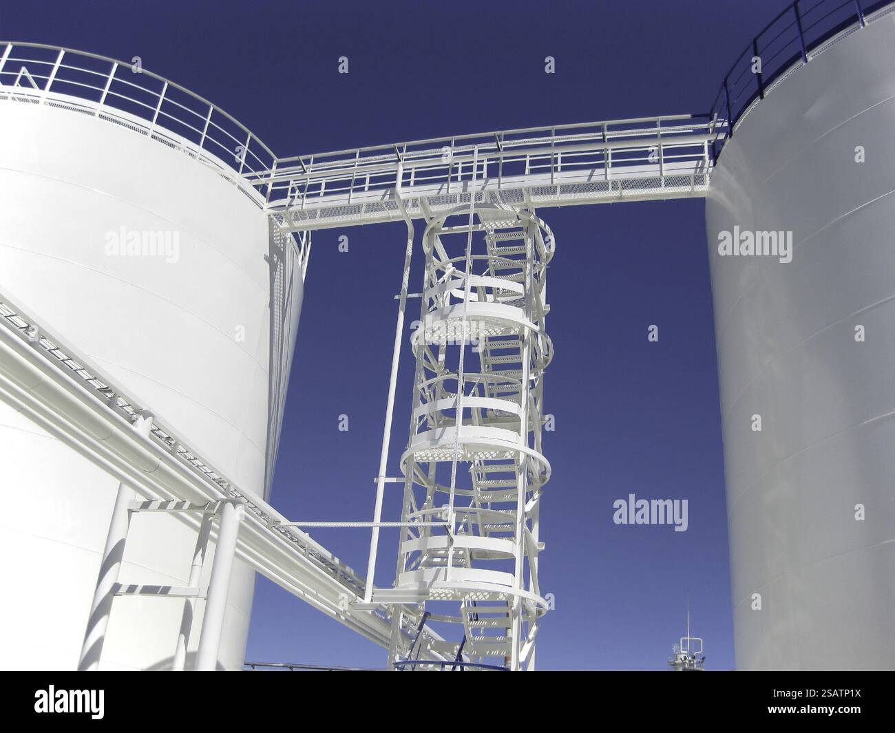 The tank with water and a ladder. Equipment for primary oil refining ...