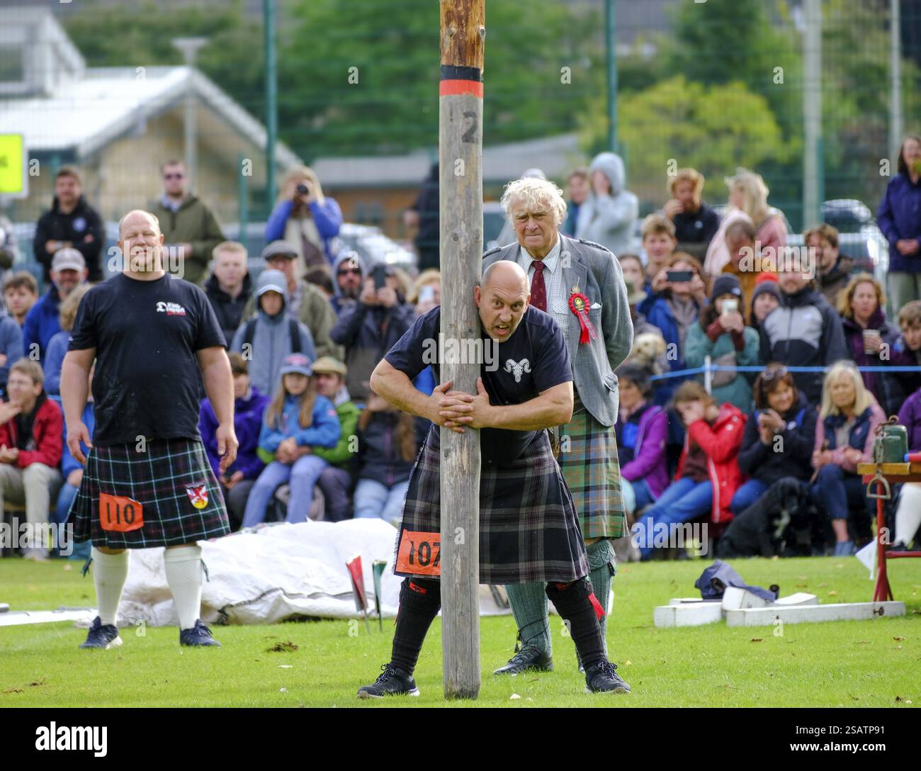 Log throwing at the traditional Glen Urquhart Highland Games, Scotland ...