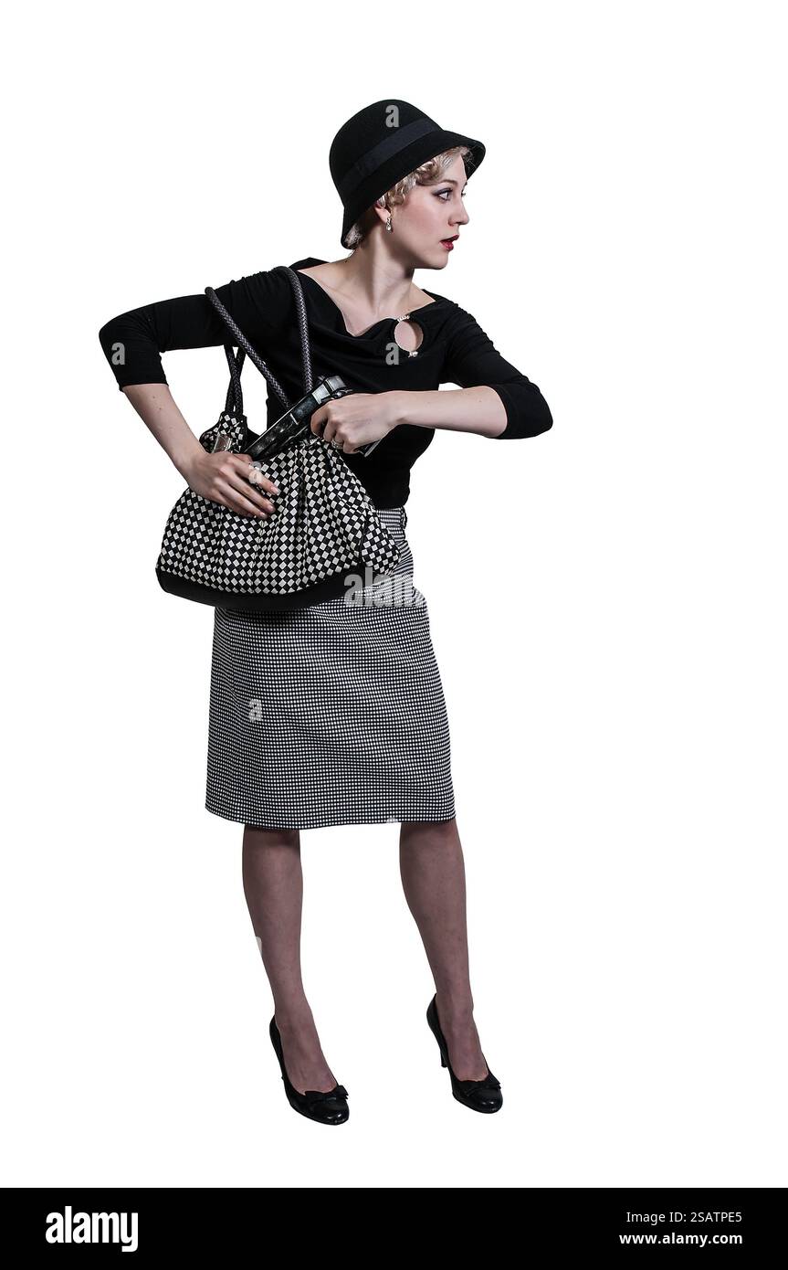 Beautiful woman with a loaded handgun pistol Stock Photo - Alamy