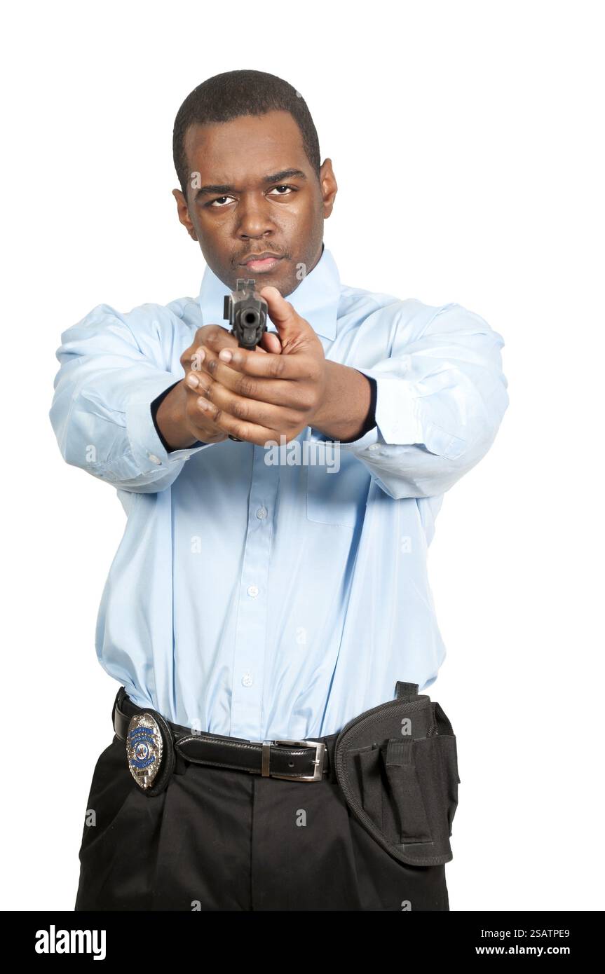 A black African American police detective man on the job with a gun ...