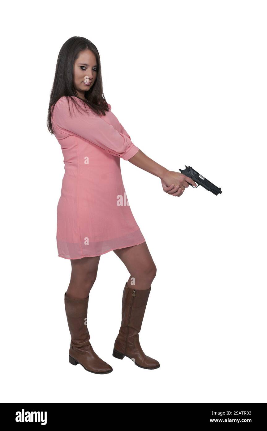 Beautiful woman with a loaded handgun pistol Stock Photo - Alamy