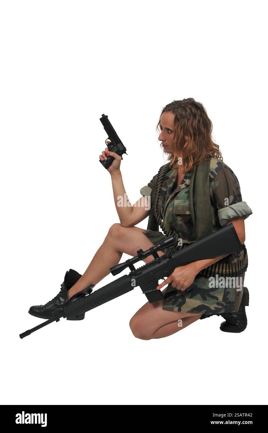 Beautiful young woman soldier with a M16 rifle and a pistol Stock Photo ...
