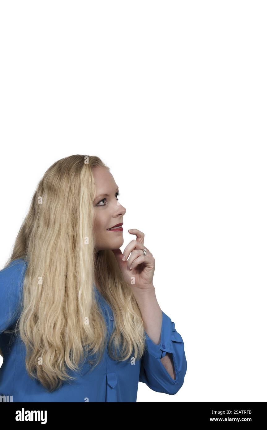 Beautiful woman thinking and deep in thought Stock Photo - Alamy